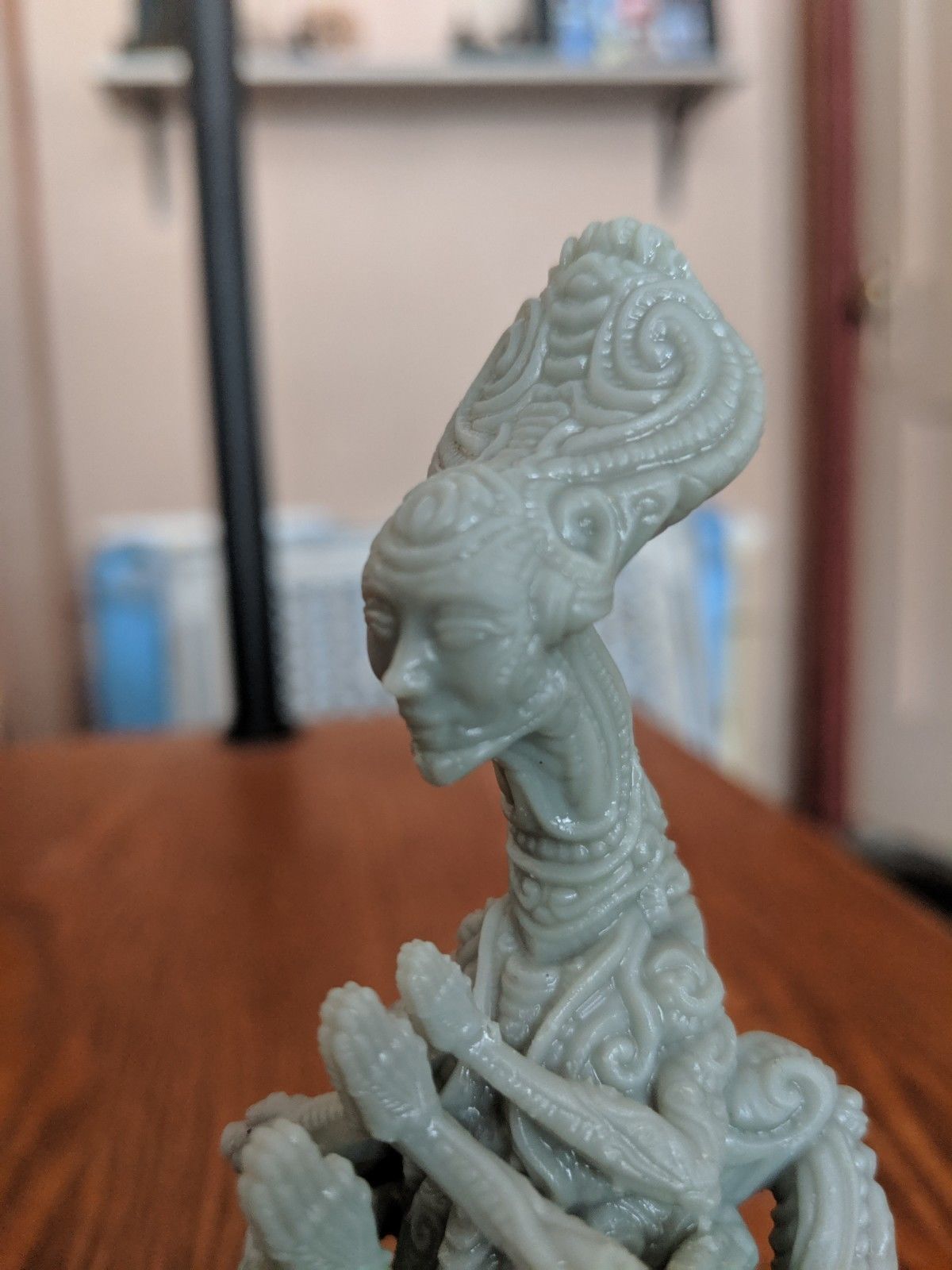 Greeter statue of woman on wooden table 3D model 3D printable | CGTrader